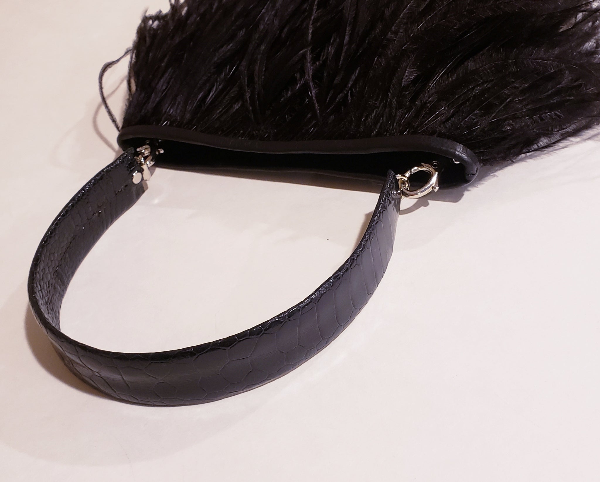 KOLUNTU | Handmade African Luxury | Fancy Feather Handbag