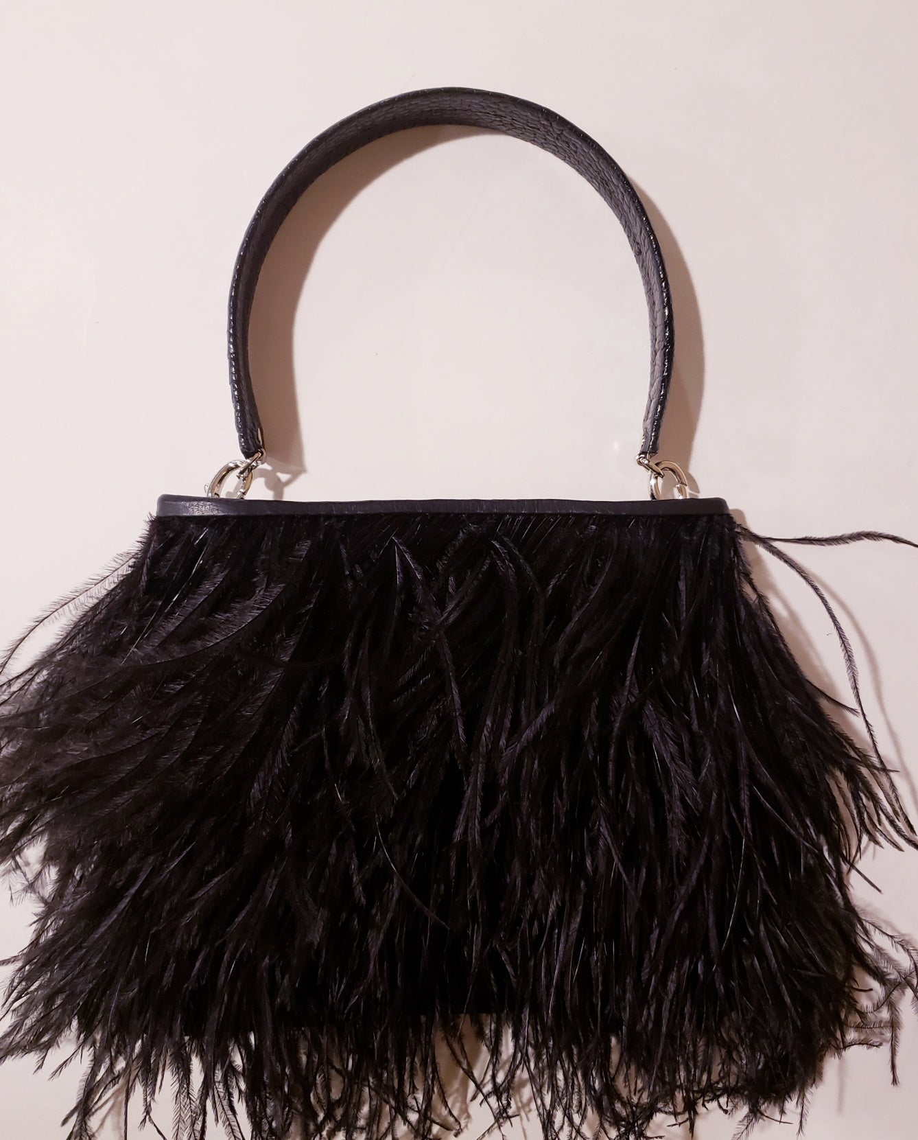 KOLUNTU | Handmade African Luxury | Fancy Feather Handbag