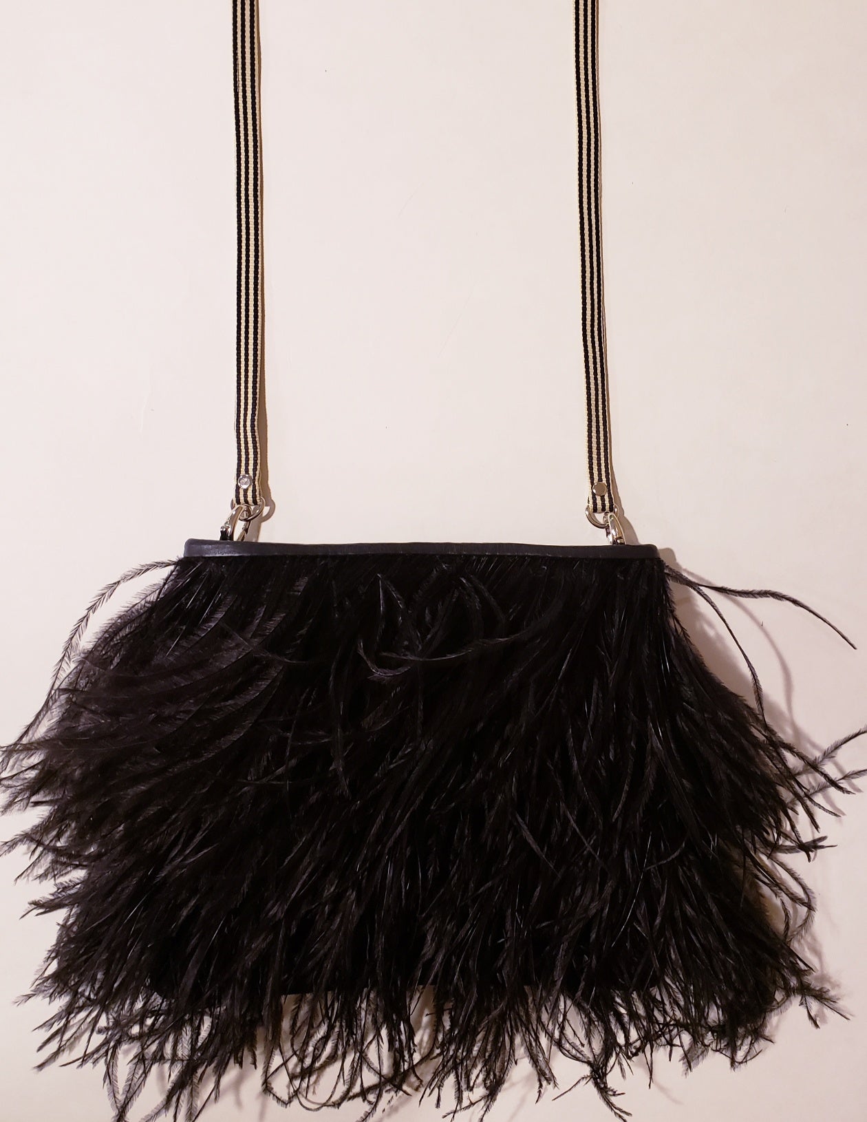 KOLUNTU | Handmade African Luxury | Fancy Feather Handbag