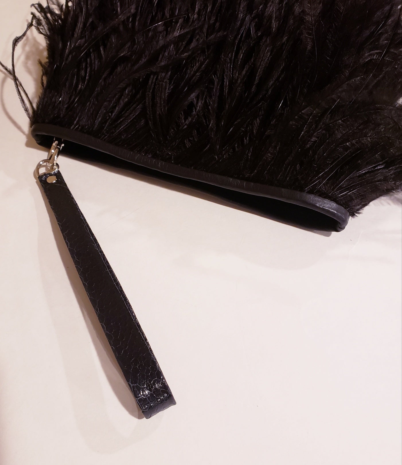 KOLUNTU | Handmade African Luxury | Fancy Feather Handbag