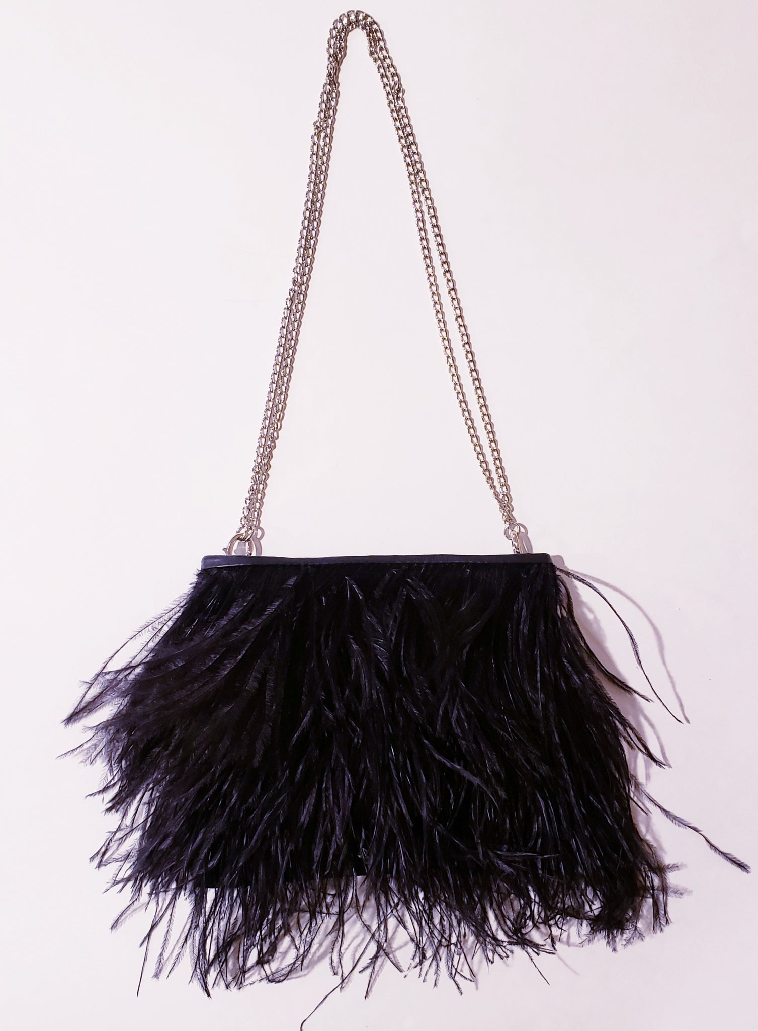 KOLUNTU | Handmade African Luxury | Fancy Feather Handbag